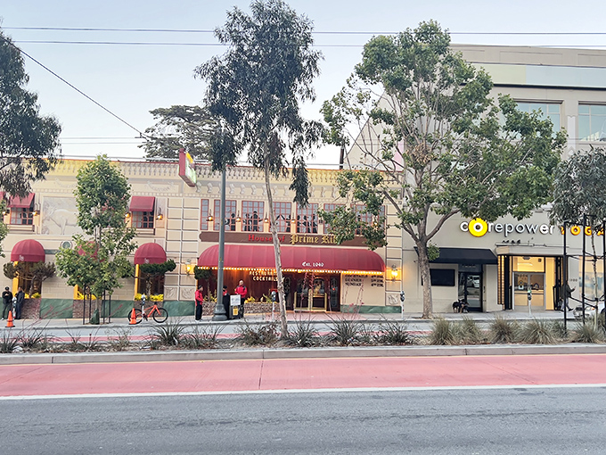 The iconic red awning of House of Prime Rib stands like a carnivore's North Star, guiding hungry San Franciscans to beefy bliss since 1949.