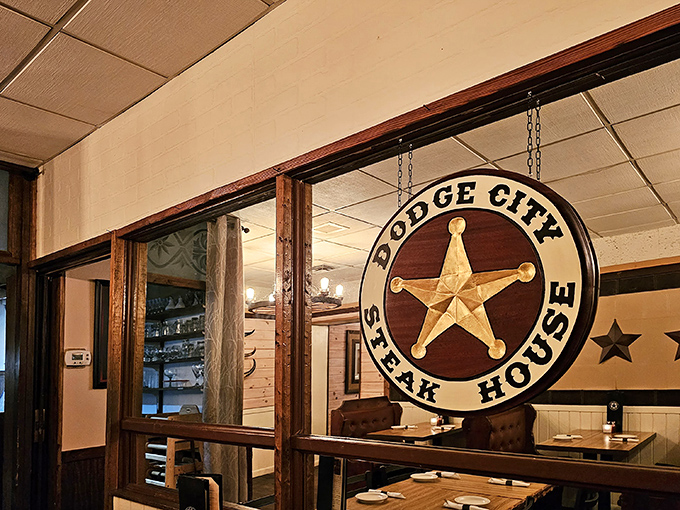 The Western-inspired exterior of Dodge City Steakhouse welcomes hungry travelers with its rustic charm and promise of carnivorous delights ahead.
