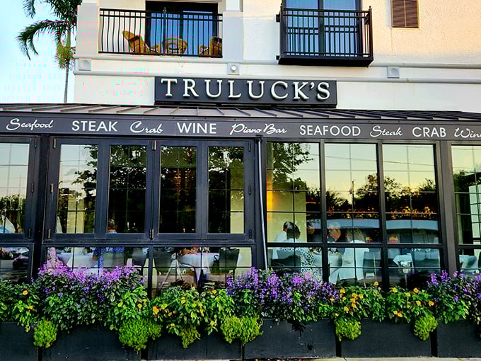 The stately exterior of Truluck's, with its vibrant flower boxes, feels like Naples' answer to "dress to impress"—casual Florida elegance with serious culinary ambitions.