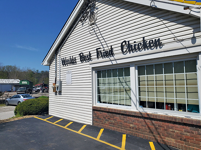 The modest white exterior boldly proclaims "World's Best Fried Chicken" – a claim that seems audacious until you taste what's cooking inside.
