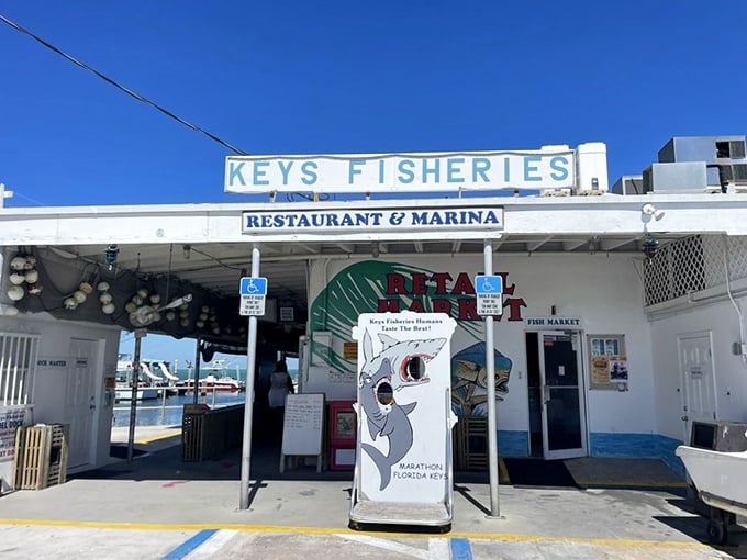 The unassuming entrance to seafood paradise. No fancy frills here—just the promise of ocean-fresh delights waiting beyond those humble doors.