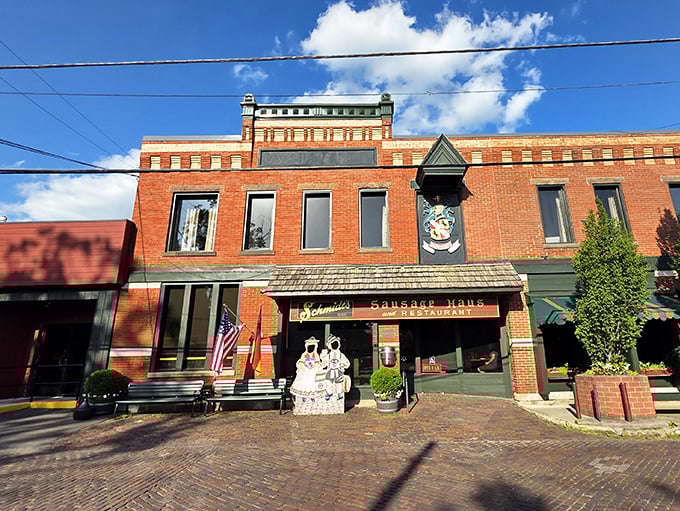 The brick façade of Schmidthaus stands proudly in Columbus Grove, where German and American flags flutter side by side—a delicious cultural alliance in the heart of Ohio.