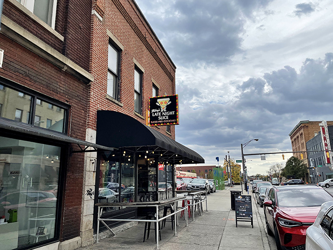 The unassuming brick exterior of Mikey's Late Night Slice beckons like a lighthouse to hungry souls wandering downtown Columbus.