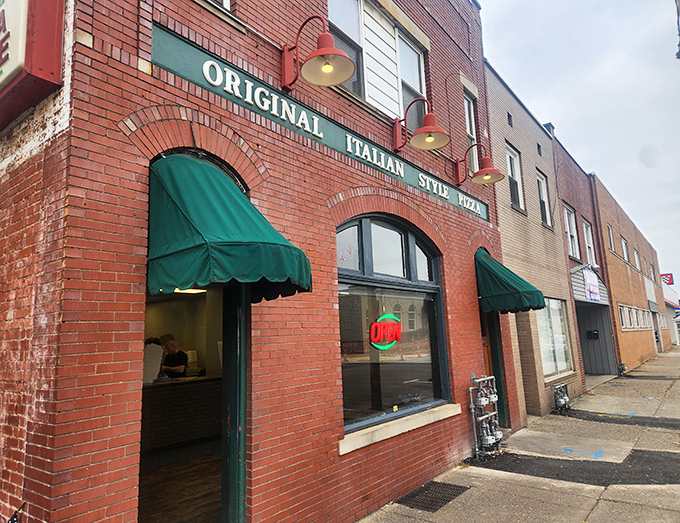 That classic red brick facade might fool you, but inside lies Pennsylvania's best-kept pepperoni secret.