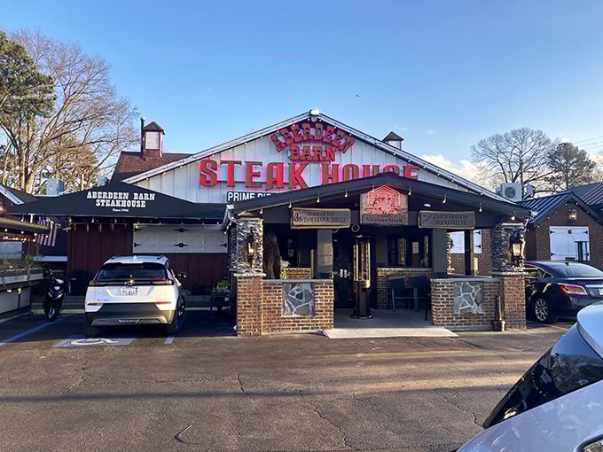 That red "Steak House" sign isn't just advertising—it's a beacon calling carnivores home to Virginia Beach's prime rib paradise.