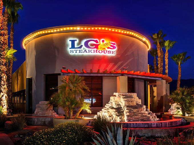 Desert nights transform this steakhouse into a glowing beacon where carnivorous dreams come true under starlit skies. 