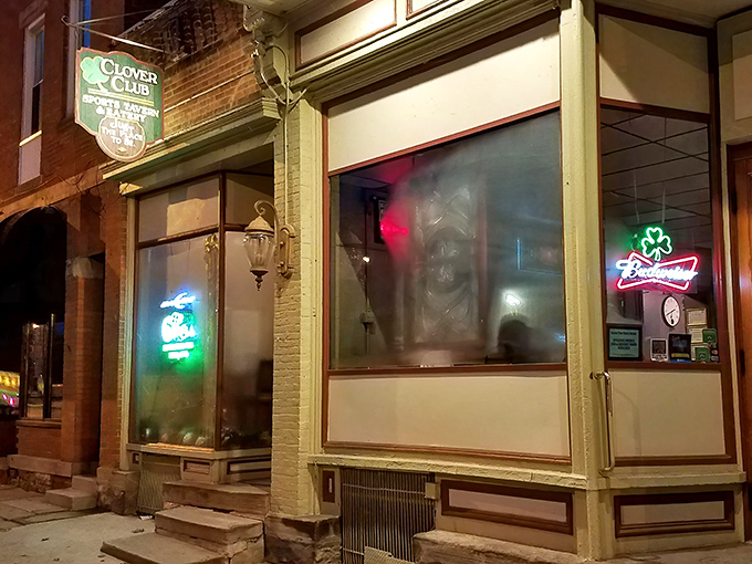 The patriotic bunting above Clover Club's storefront isn't just decoration—it's a promise that inside awaits the kind of all-American comfort food that makes you salute your sandwich.