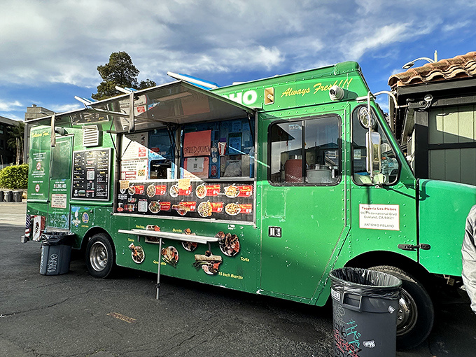 The emerald-green chariot of culinary dreams sits ready for action. Tacos Mi Rancho's vibrant food truck promises Mexican delights that'll make your taste buds stand at attention.