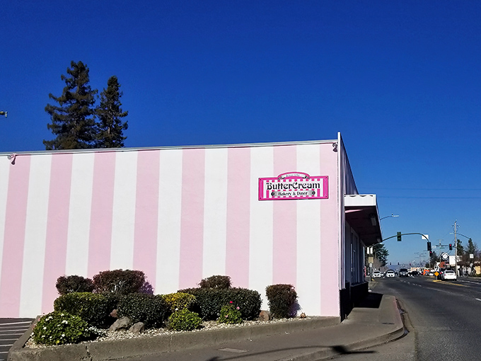 The pink and white striped exterior of Butter Cream Bakery isn't just eye-catching—it's like Willy Wonka designed a building in wine country.