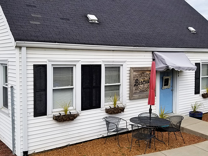 The unassuming white cottage exterior of Sweet Biscuit Company proves once again that culinary treasures often hide in plain sight.