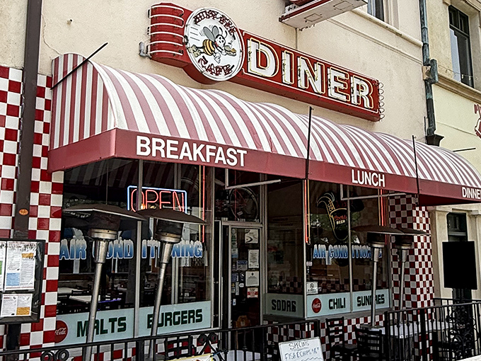 The classic red and white checkered exterior of Busy Bee Cafe isn't just inviting—it's practically shouting "Get in here and eat something wonderful!"