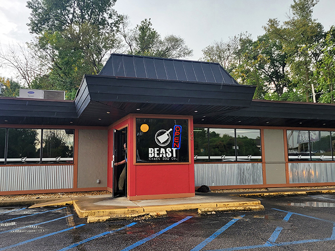 The unassuming exterior hides barbecue greatness like Clark Kent's glasses hide Superman. Red accents hint at the flavor explosions waiting inside.