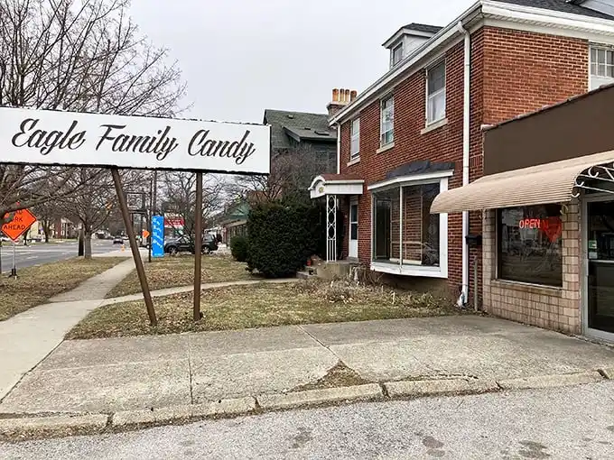 The unassuming brick building houses Columbus's sweetest secret – where chocolate dreams come true behind that simple "Eagle Family Candy" sign.