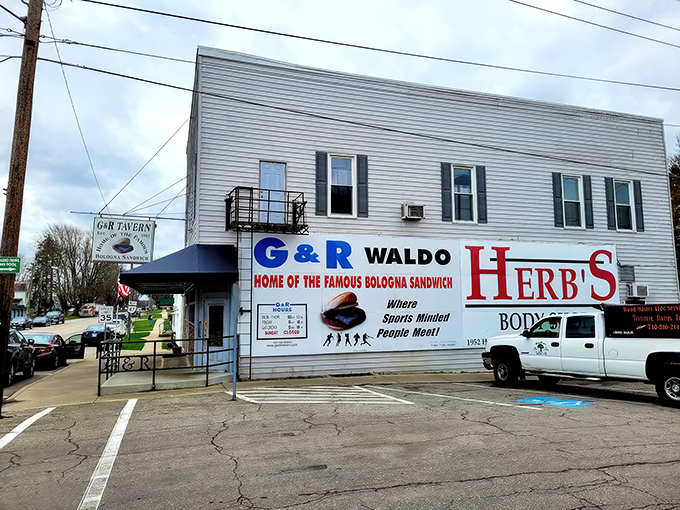 The unassuming exterior of G & R Tavern in Waldo, Ohio—proof that culinary legends don't need fancy facades to become destinations worth the drive.