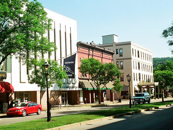 Wellsboro's Main Street feels like time travel with modern conveniences – gas lamps line a boulevard where American flags flutter and neighbors still wave hello.