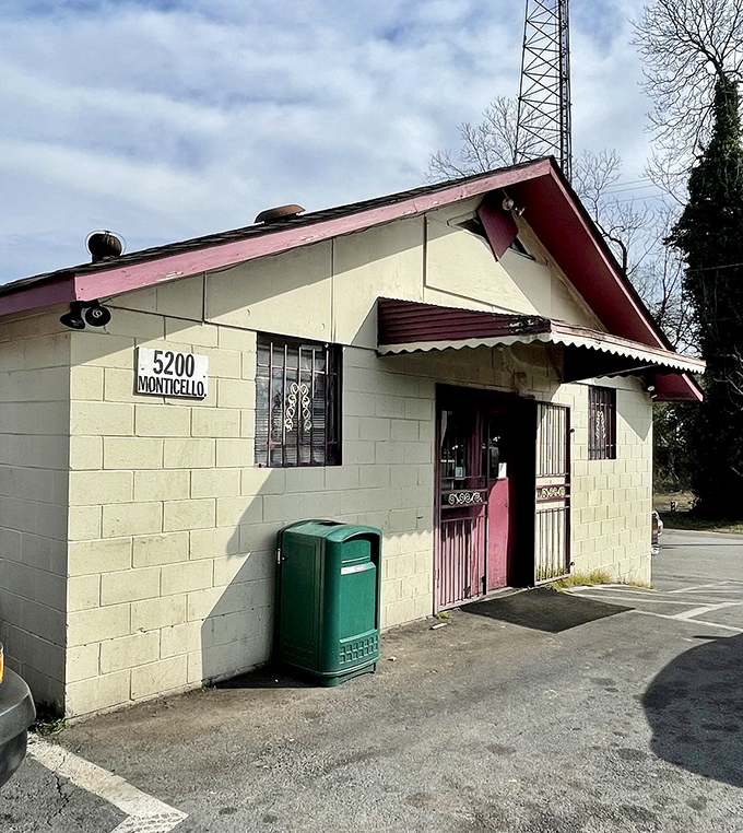 The unassuming exterior of Johnson's Restaurant proves once again that culinary treasures often hide in plain sight. That pink trim is your beacon to burger paradise.