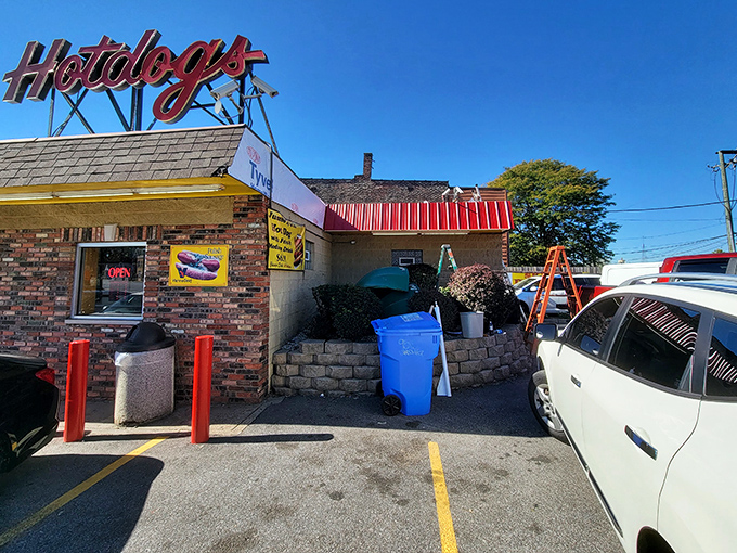 The unassuming brick exterior of Skyway Doghouse stands as a beacon to Chicago food pilgrims. That vintage "Hotdogs" sign has been guiding hungry souls for generations.