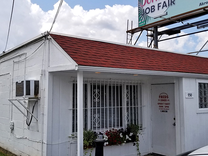 The unassuming exterior of Fred's Diner proves once again that culinary treasures often hide in plain sight. This white-painted Akron institution promises zero pretension and maximum flavor.