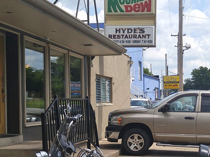 The unassuming exterior of Hyde's Restaurant promises little but delivers everything—bright orange window signs inviting you to enjoy "Dinner & Pie" every day.