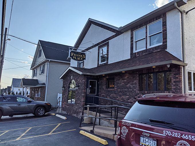 The unassuming brick facade of Frank's Place in Simpson hides culinary treasures within—like finding a Rolex in your uncle's old fishing vest.