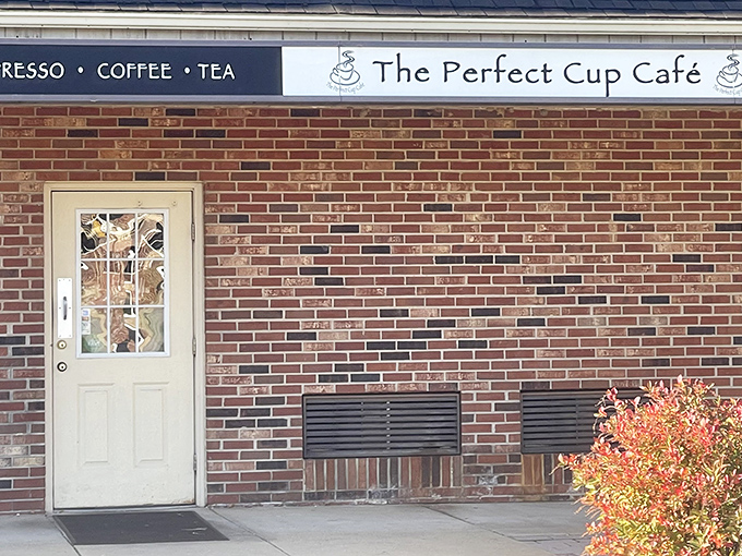 The unassuming brick exterior of The Perfect Cup Café hides culinary treasures that would make even the most jaded food critic weak in the knees.