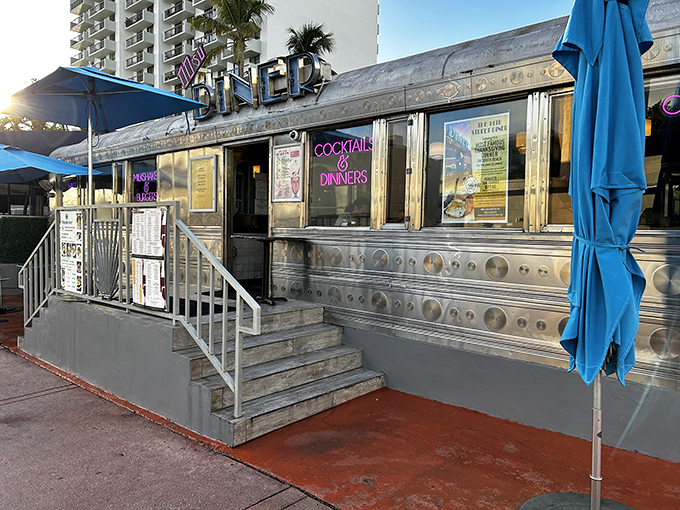 This gleaming silver time machine isn't waiting for Doc Brown – it's serving up nostalgia and killer BBQ ribs on Miami Beach's 11th Street.