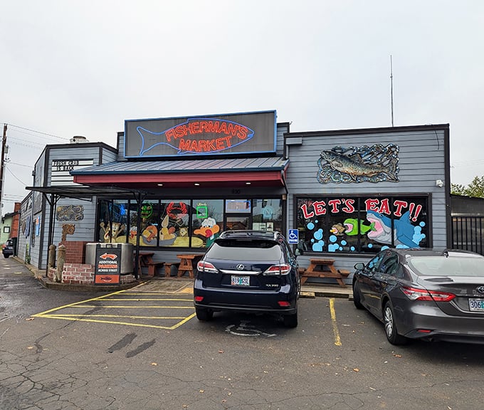 The neon glow of Fisherman's Market beckons like a lighthouse for hungry souls. Those picnic tables outside aren't just seating—they're stages for impending seafood euphoria.