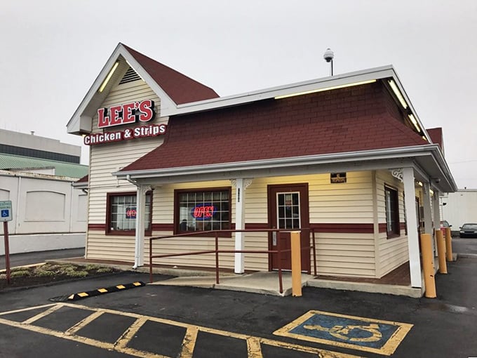 The iconic red-roofed Lee's Famous Recipe Chicken stands like a beacon of comfort food promise, beckoning hungry Virginians with its no-nonsense charm.