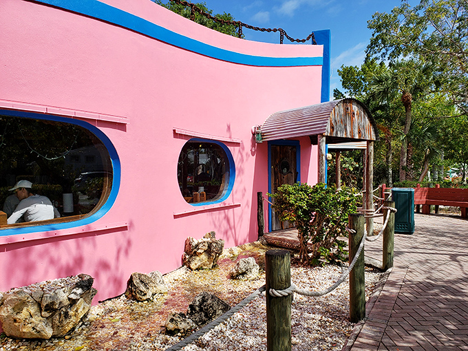 The flamingo-pink exterior isn't just eye-catching—it's a promise of the colorful culinary experience waiting inside this Sanibel Island gem.