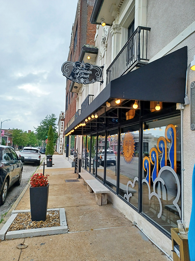 The stately Art Deco façade of The Fountain on Locust stands as a culinary beacon on St. Louis' historic Locust Street, promising retro delights within.