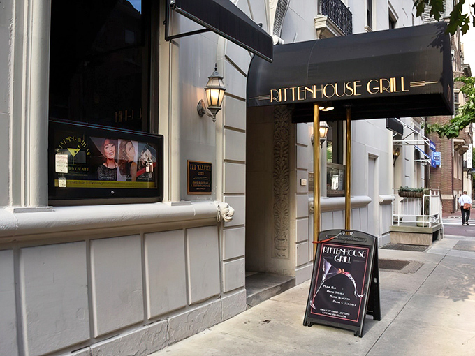 The golden lettering against that classic façade isn't just signage—it's a promise of the culinary magic waiting inside this Philadelphia landmark.