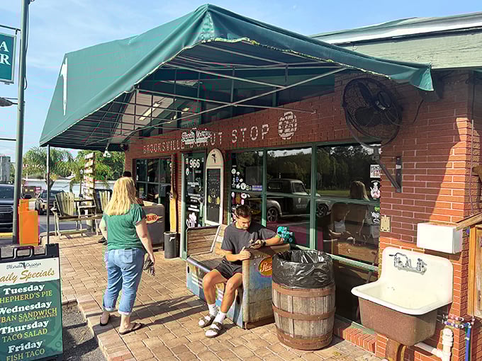 The brick facade of Florida Cracker Kitchen promises authentic Florida heritage before you even step inside. Real estate indeed—this is prime territory for comfort food enthusiasts.