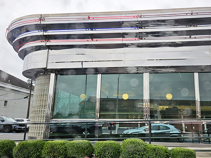 The neon-trimmed exterior of Metro 29 Diner glows like a beacon of hope for the hungry, a chrome-clad time machine promising comfort food salvation.