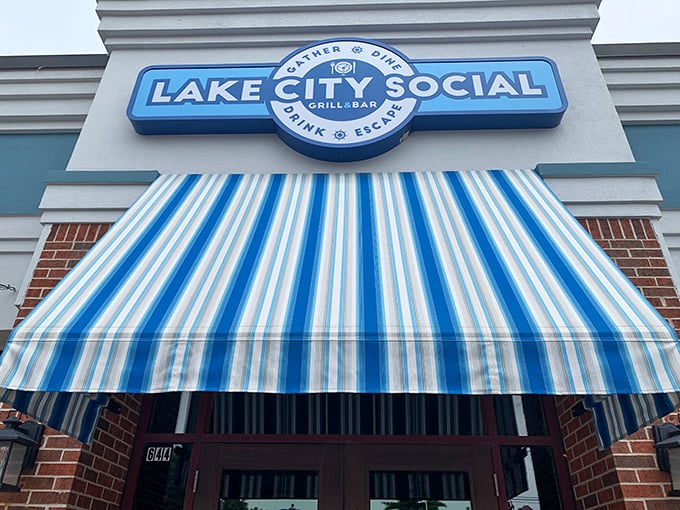 Blue skies and blue awnings welcome you to Lake City Social, where flower boxes burst with color like Wisconsin summer itself.