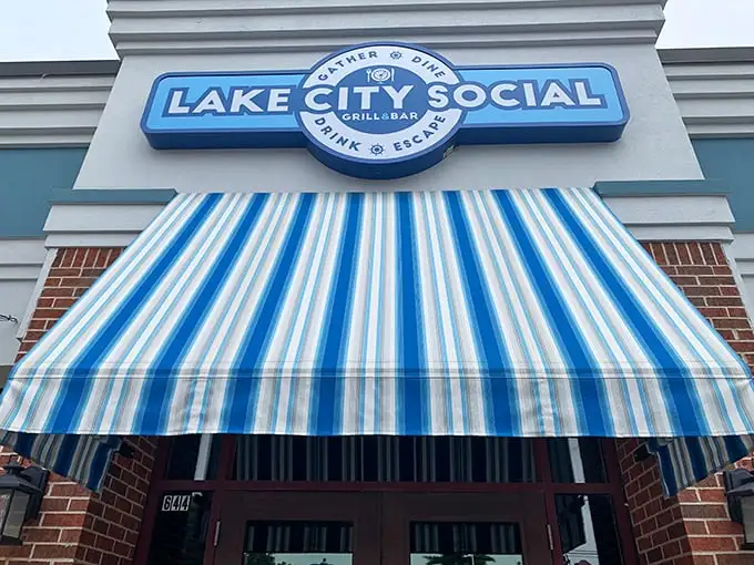 Blue skies and blue awnings welcome you to Lake City Social, where flower boxes burst with color like Wisconsin summer itself.