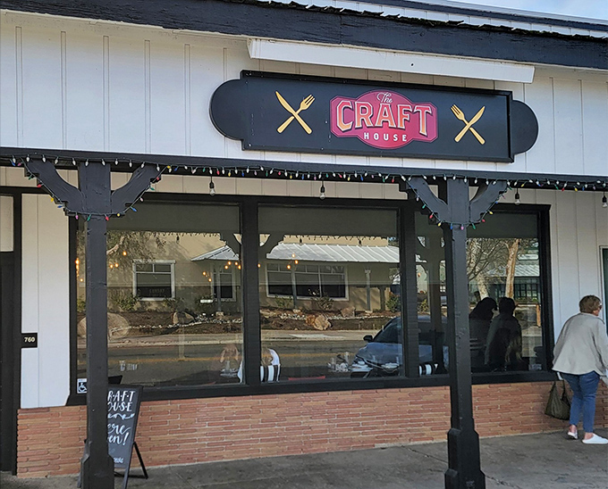 The Craft House's charming exterior beckons with its classic white siding and distinctive black signage—like a culinary lighthouse guiding hungry travelers home.