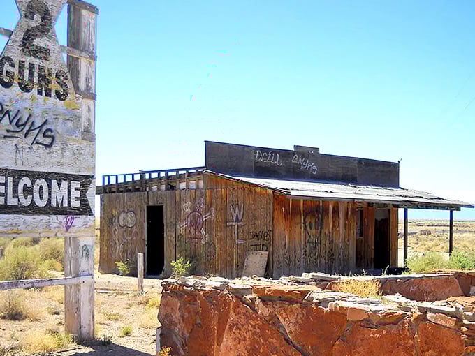 Welcome signs never looked so beautifully weathered – this desert greeting has stories etched in every crack.