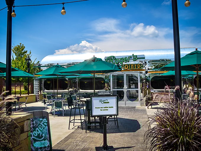The outdoor patio at Roger's Diner feels like summer vacation incarnate – complete with string lights that promise evening magic under North Carolina skies.