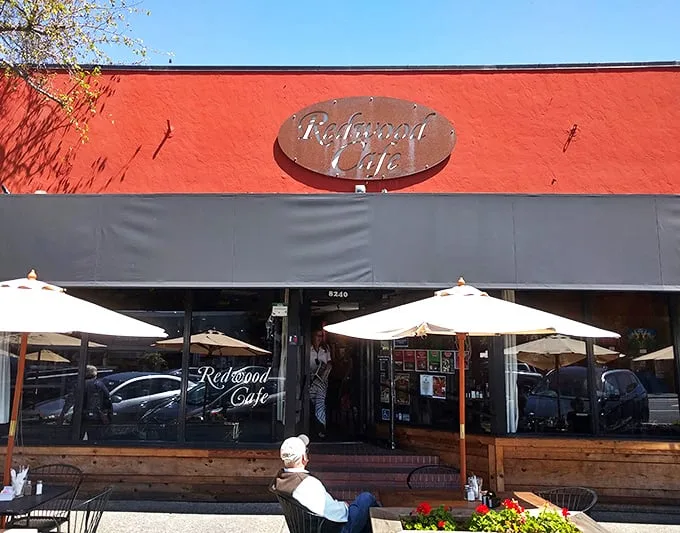 The vibrant red exterior of Redwood Cafe stands out like a culinary beacon in Cotati, promising comfort food worth the journey.