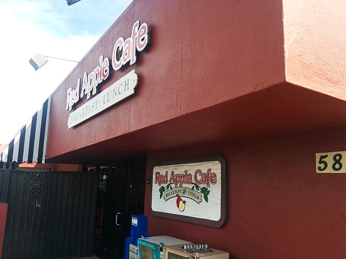 The unassuming exterior of Red Apple Cafe proves once again that culinary treasures often hide behind modest façades. That red-striped awning is basically a superhero cape for breakfast lovers.
