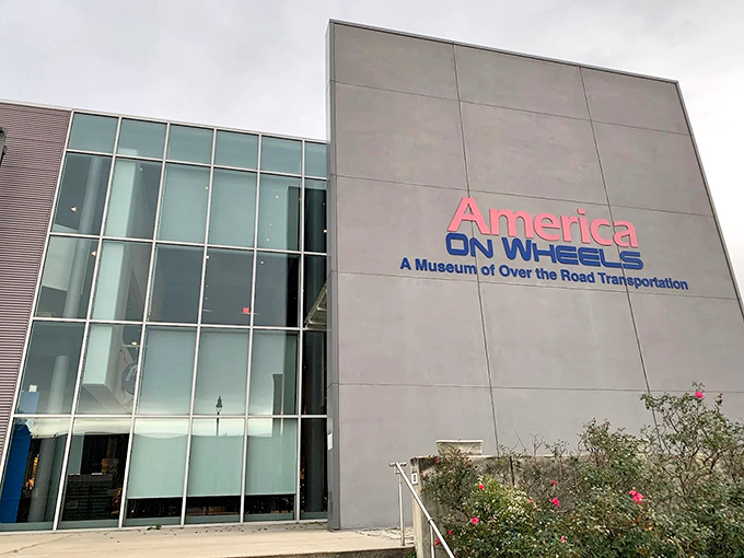 The sleek modern exterior of America On Wheels stands like a temple to transportation history, its glass façade reflecting Allentown's industrial heritage and automotive future.