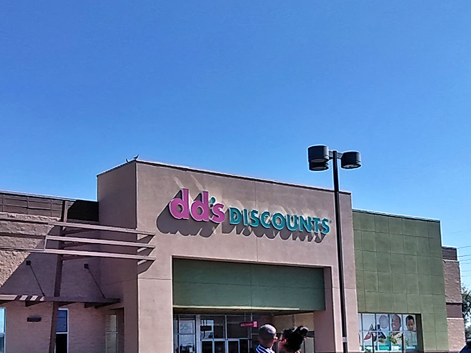 The iconic pink and teal dd's DISCOUNTS sign promises retail therapy that won't require financial therapy afterward—a beacon of budget-friendly bliss in Glendale.
