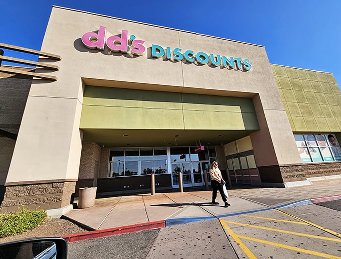 The iconic pink and teal dd's DISCOUNTS sign promises retail therapy that won't require financial therapy afterward—a beacon of budget-friendly bliss in Glendale.