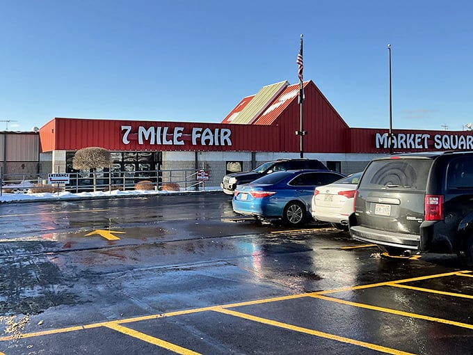 The iconic red-roofed entrance to 7 Mile Fair stands like a retail Narnia wardrobe—step through and enter a world of endless possibilities.