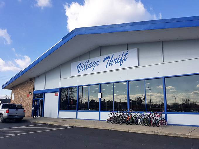 The bright blue trim of Village Thrift beckons like a siren call to bargain hunters. Those bicycles? Just the first clue you'll need bigger transportation for your haul.