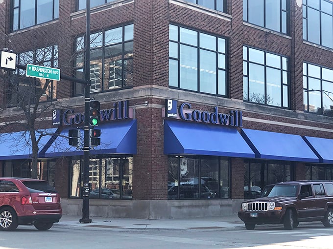 The iconic blue awning of Chicago's Goodwill beckons like a portal to possibility—where one person's castoffs become another's treasures.