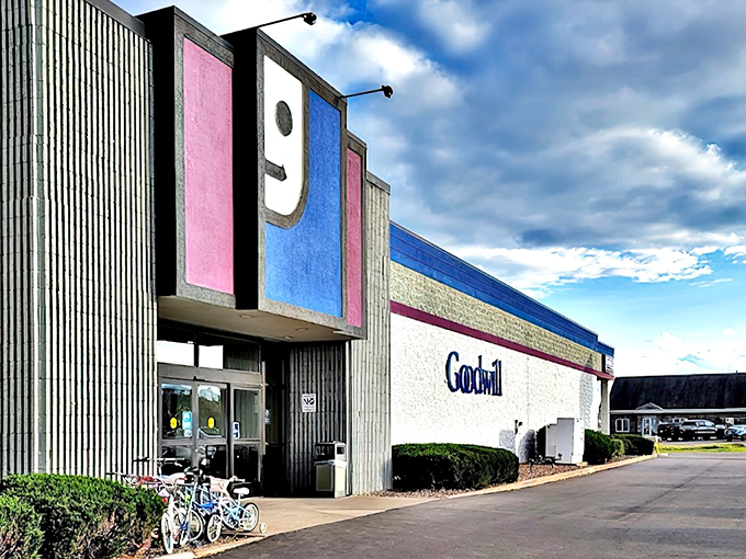 The iconic Goodwill "G" logo welcomes bargain hunters to this Eau Claire treasure trove, where Wisconsin thrift enthusiasts begin their quest for hidden gems.