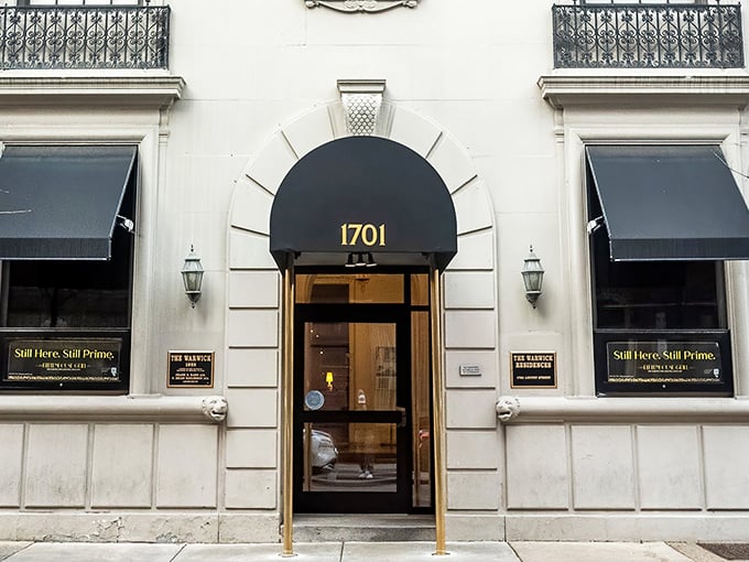 The golden lettering against that classic façade isn't just signage—it's a promise of the culinary magic waiting inside this Philadelphia landmark.
