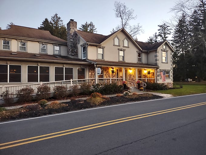 The unassuming exterior of The Frogtown Chophouse feels like discovering a secret culinary hideaway in the Poconos, where extraordinary flavors await behind that welcoming porch.