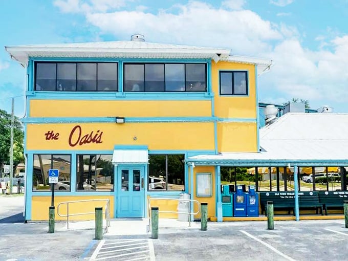 The bright yellow exterior with turquoise trim isn't trying to be subtle – it's shouting "Fresh seafood here!" like a friendly fishmonger at dawn.
